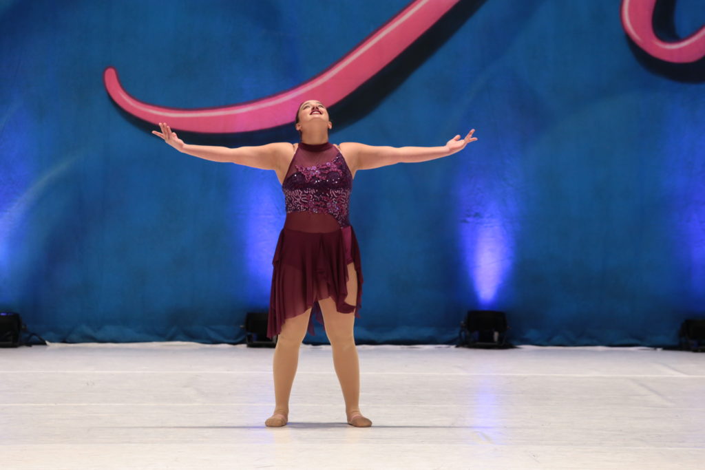 Red arms open | Merrilee Studios